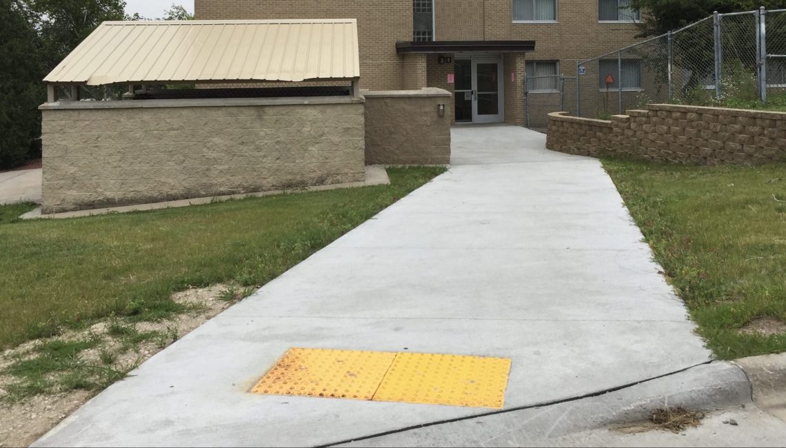 Sidewalk banner cover - RR Walton Concrete & Construction